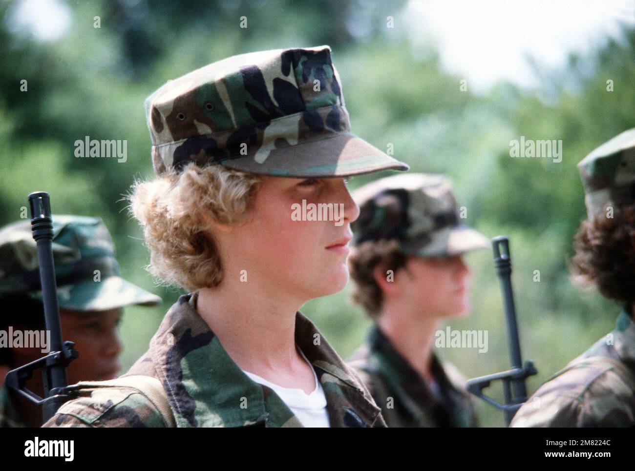 Recruits from the Woman Recruit Training Command listen to firing range ...