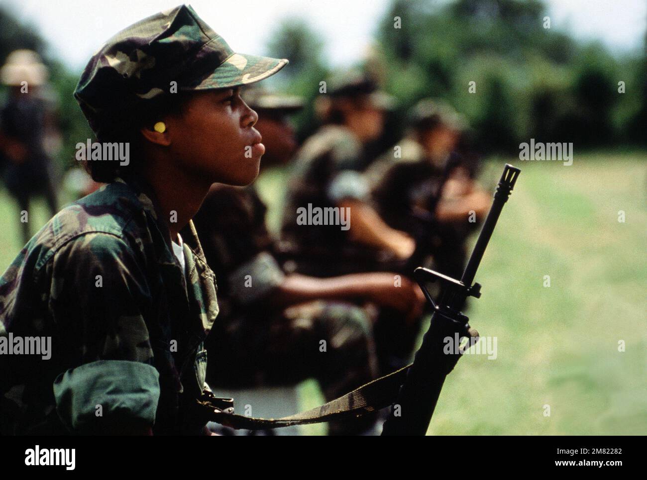 A recruit from the Woman Recruit Training Command participates in M ...