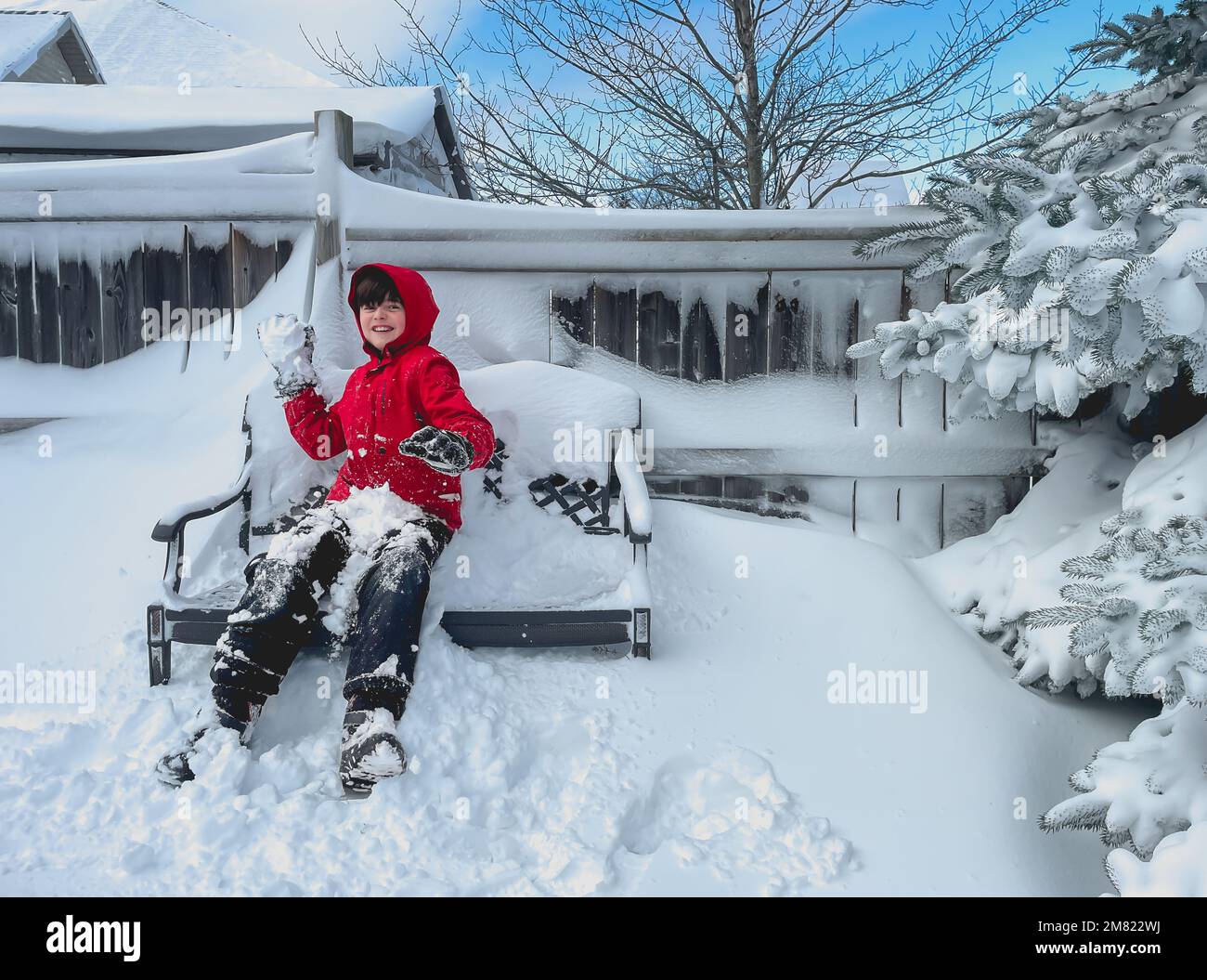 Boy in snow storm hi-res stock photography and images - Alamy