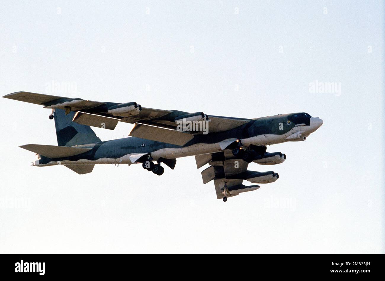 An air-to-air right front view of a B-52 Stratofortress aircraft during ...