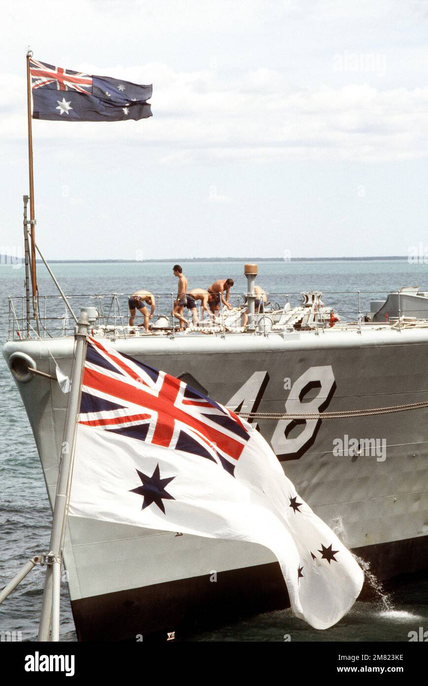A port bow view of the Australian frigate HMAS STUART (D 48) framed by ...