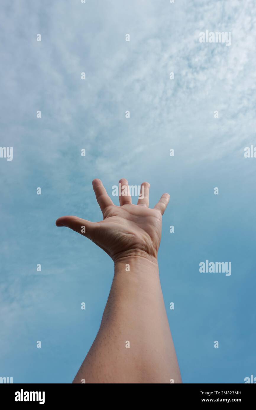 Hand in the air people reaching hi-res stock photography and images - Alamy