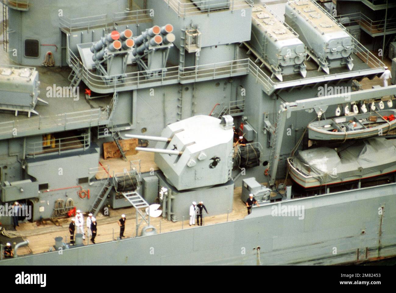 The 5-inch .38-caliber dual gun mount on the starboard side of the USS ...