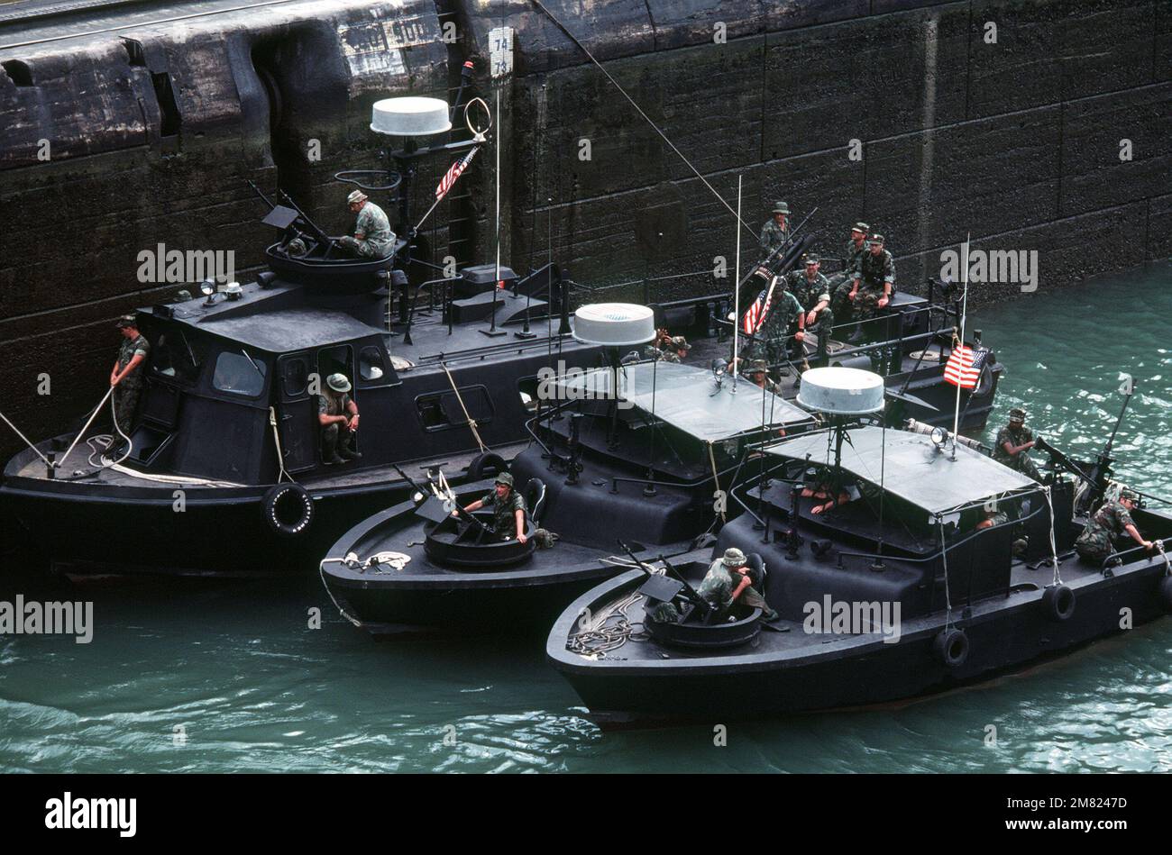 Two PBR Mark II river patrol boats and a PCF Mark I inshore patrol ...