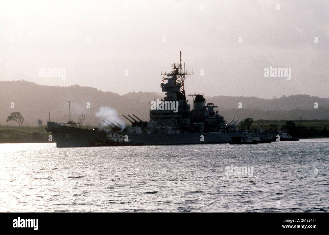 A port bow view of the battleship USS NEW JERSEY (BB 62) heading for ...
