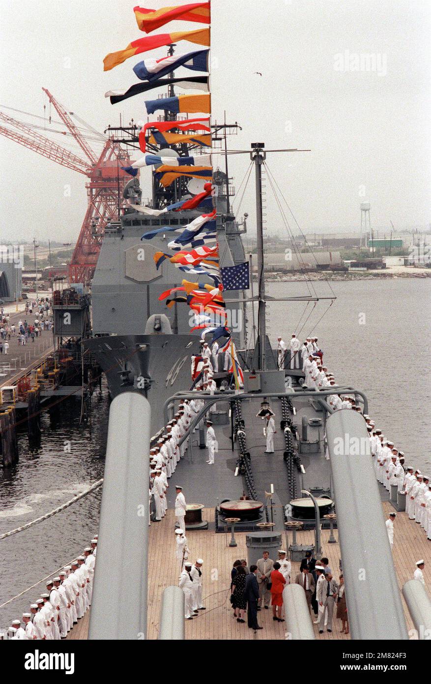 Crewmembers man the rail of the battleship USS IOWA (BB-61) during the ...