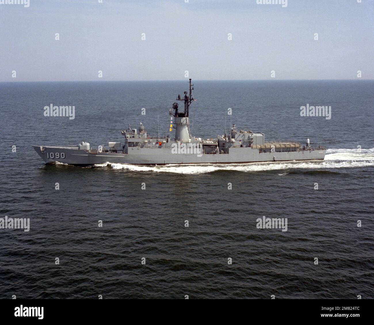 A port beam view of the frigate USS AINSWORTH (FF-1090) underway ...
