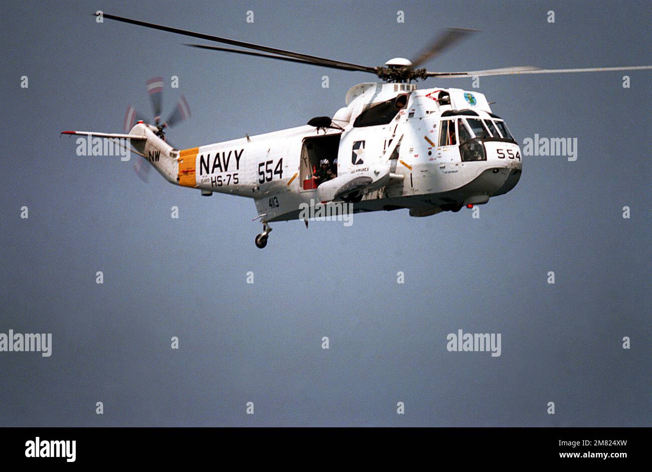 An air-to-air right side view of a Helicopter Anti-submarine Squadron ...