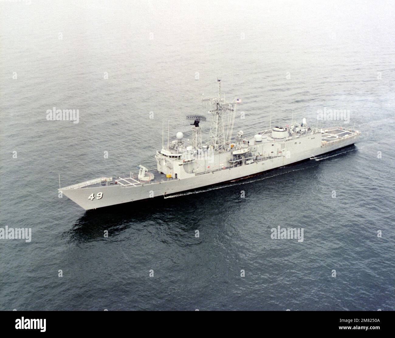 An elevated port bow view of the guided missile frigate ROBERT G ...