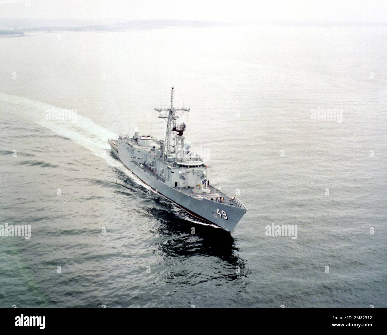 An elevated starboard bow view of the guided missile frigate ROBERT G ...