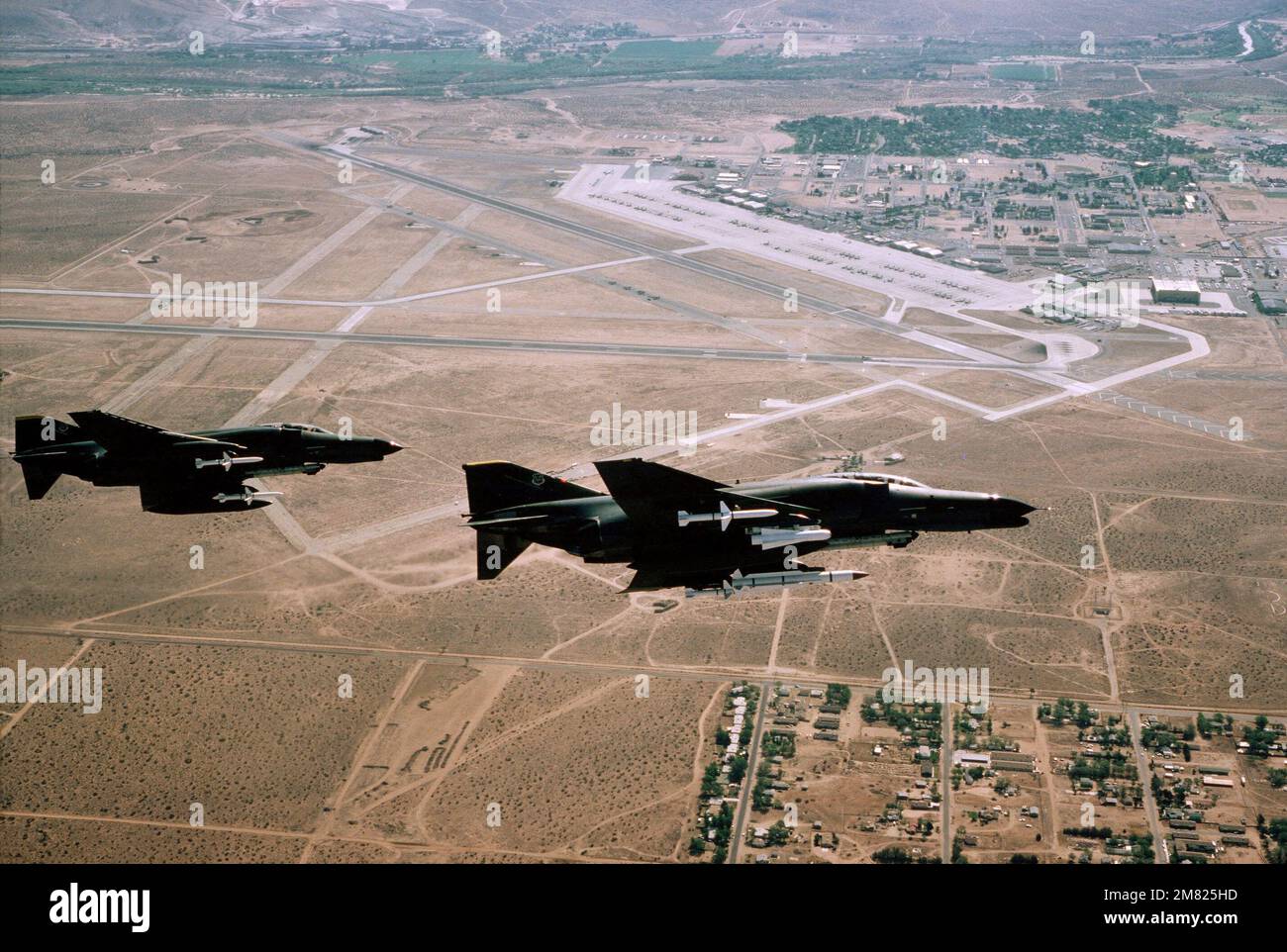A right side view of an F-4G Advanced Wild Weasel Phantom II and an F ...
