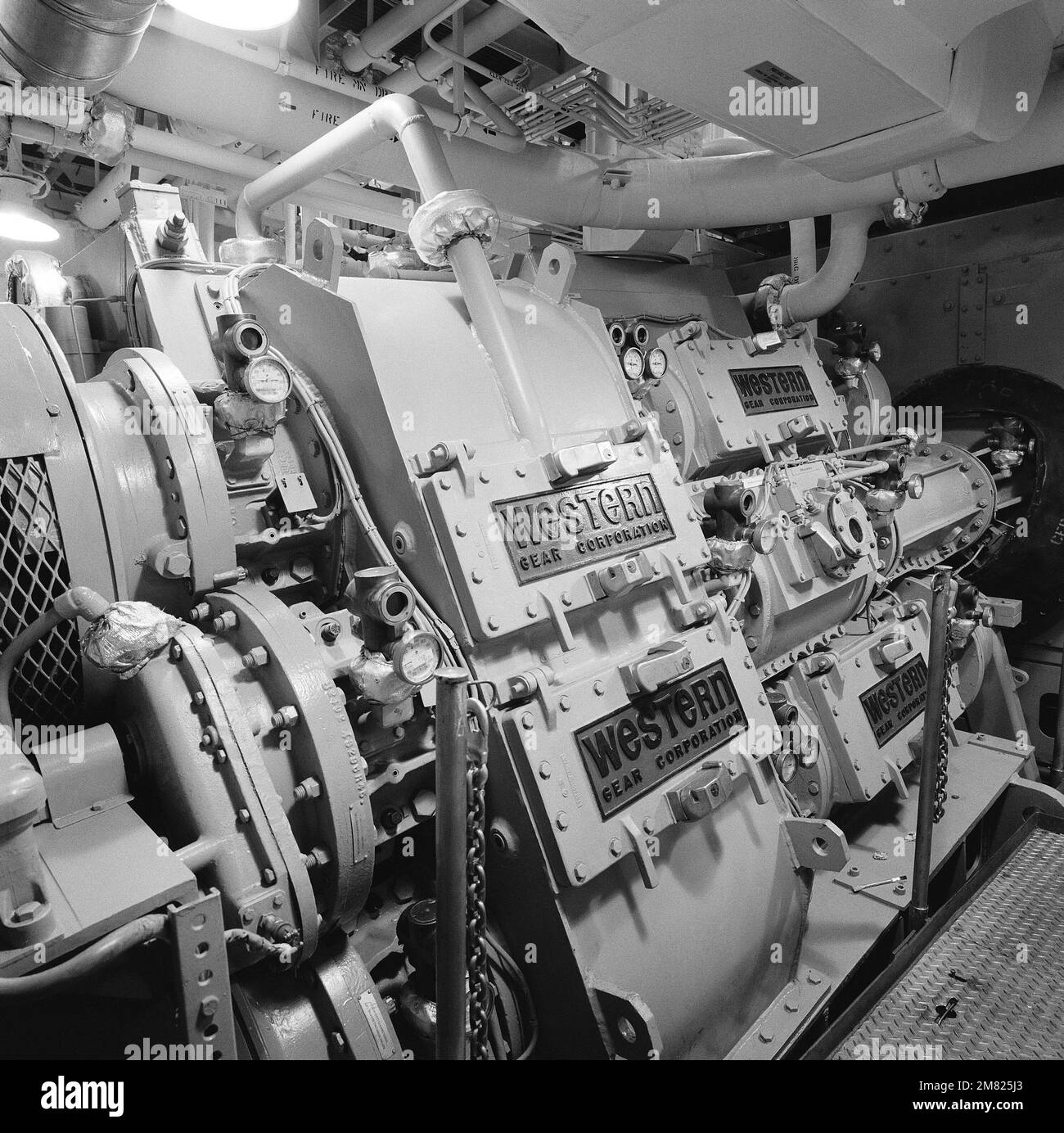 The main engine room of the guided missile frigate RENTZ (FFG 46). The ...
