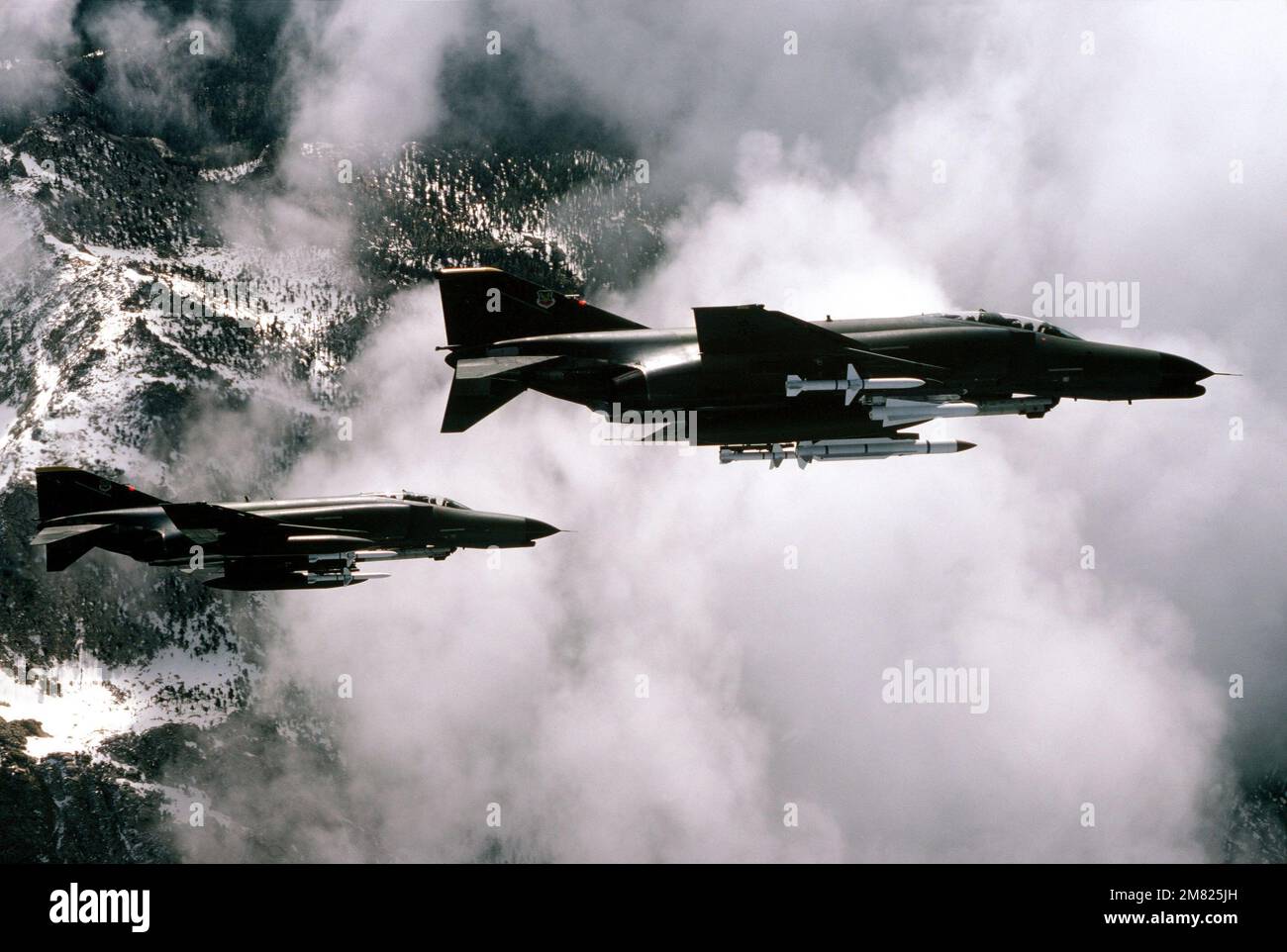A right side view of an F-4G Advanced Wild Weasel Phantom II and an F ...