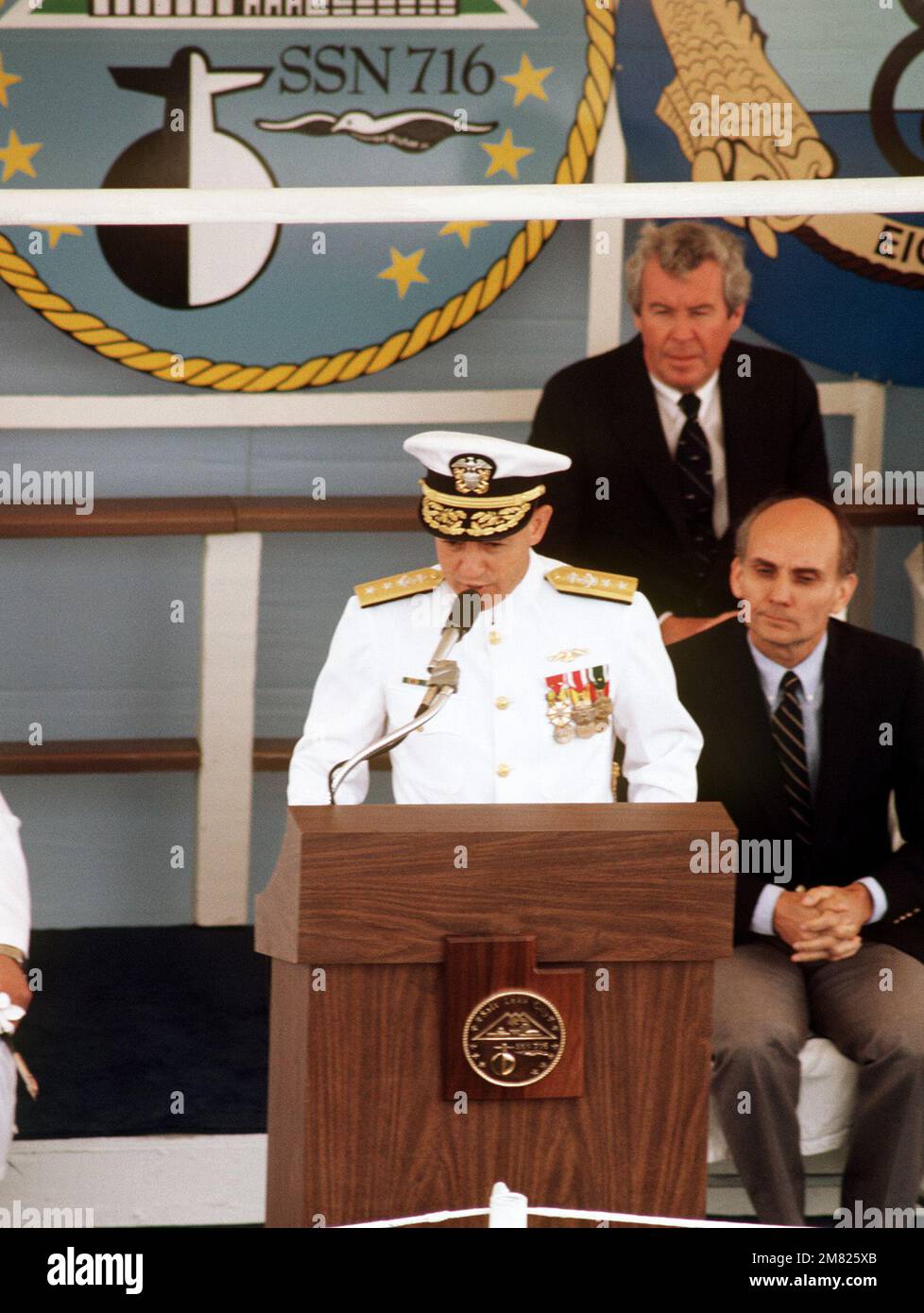 Rear Admiral Stanley G. Catola, Commander, Submarine Group 6, addresses ...
