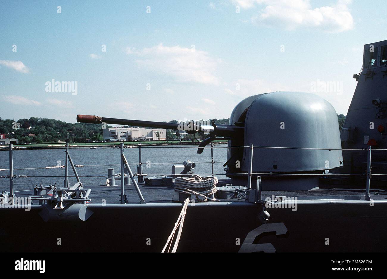 A port side view of the Mark 75 76mm OTO Melara gun on the bow of the ...