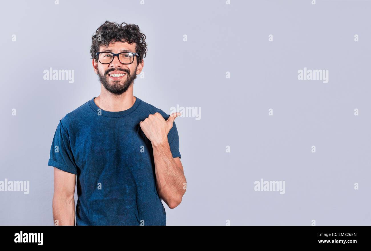 Cheerful friendly man showing you the direction to a nice place ...