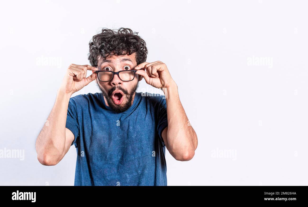 Surprised handsome man taking off his glasses, Person taking off his ...