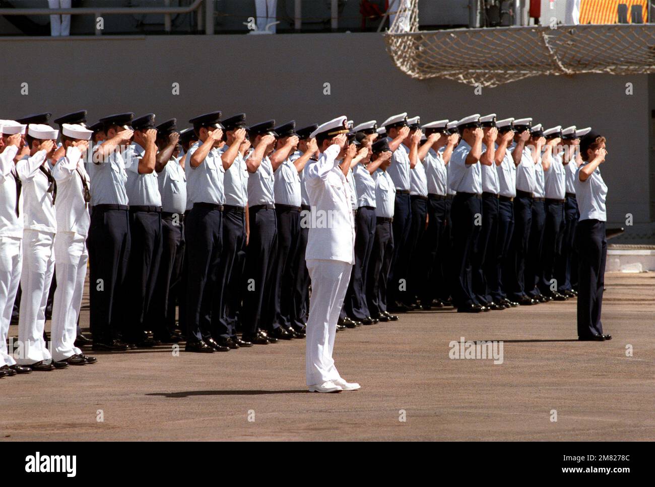 Navy, Coast Guard and Air Force personnel salute the Unknown Serviceman ...