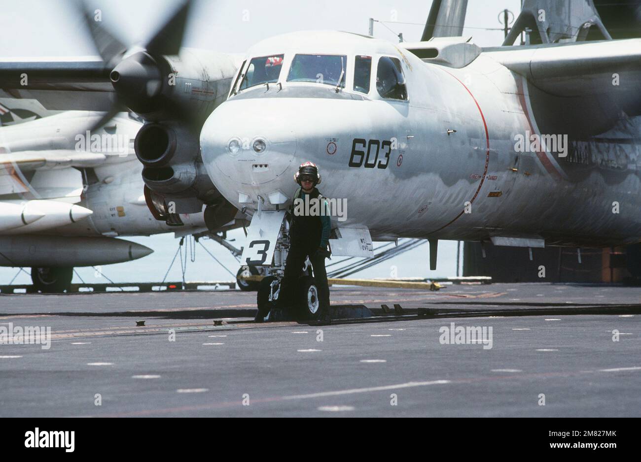 An E-2 Hawkeye airborne early warning aircraft prepares for takeoff on ...