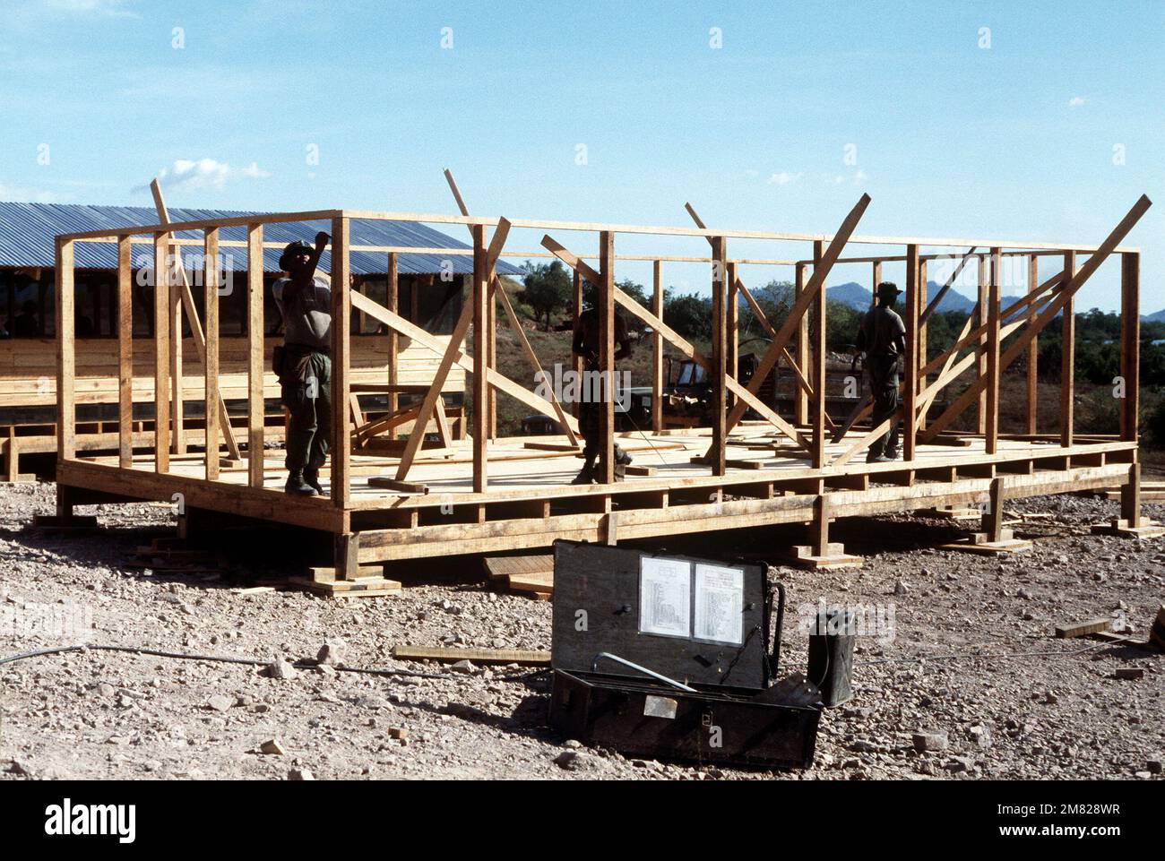 Army engineers build barracks inside the Joint Task Force area during ...