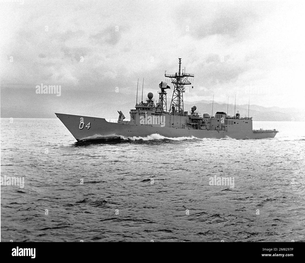 Aerial port bow view of the HMAS DARWIN (F 04) underway. This frigate ...