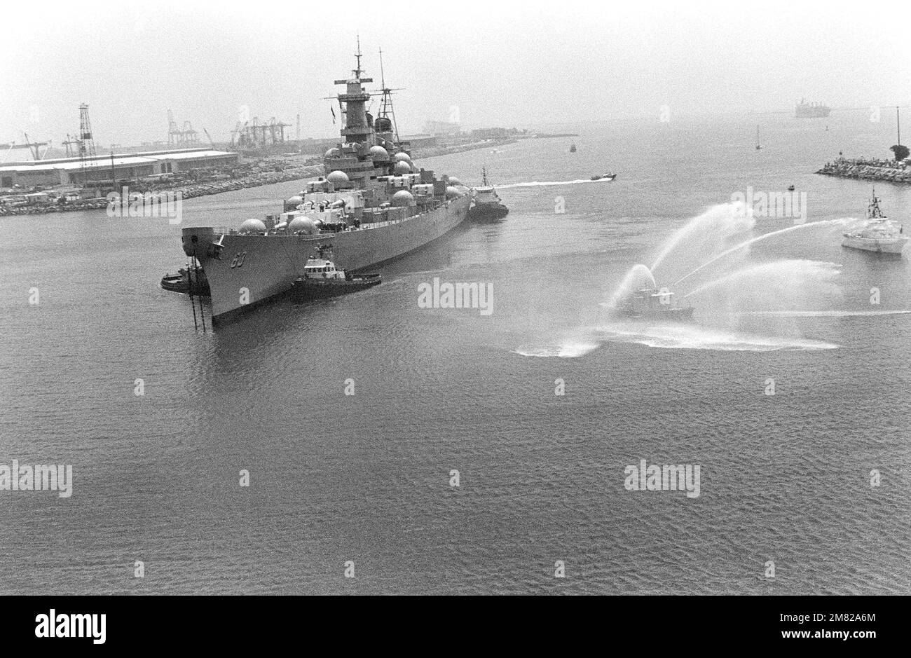 Tugs tow the battleship MISSOURI (BB 63) to Long Beach Naval Shipyard ...
