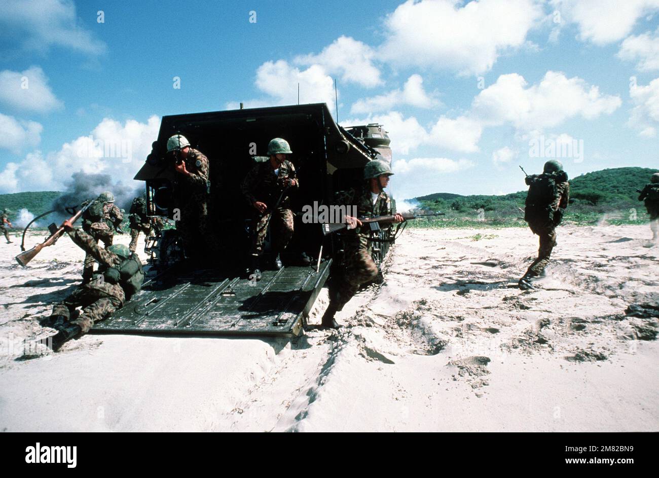 Colombian marines exit from a U.S. Marine Corps Personnel Tracked ...