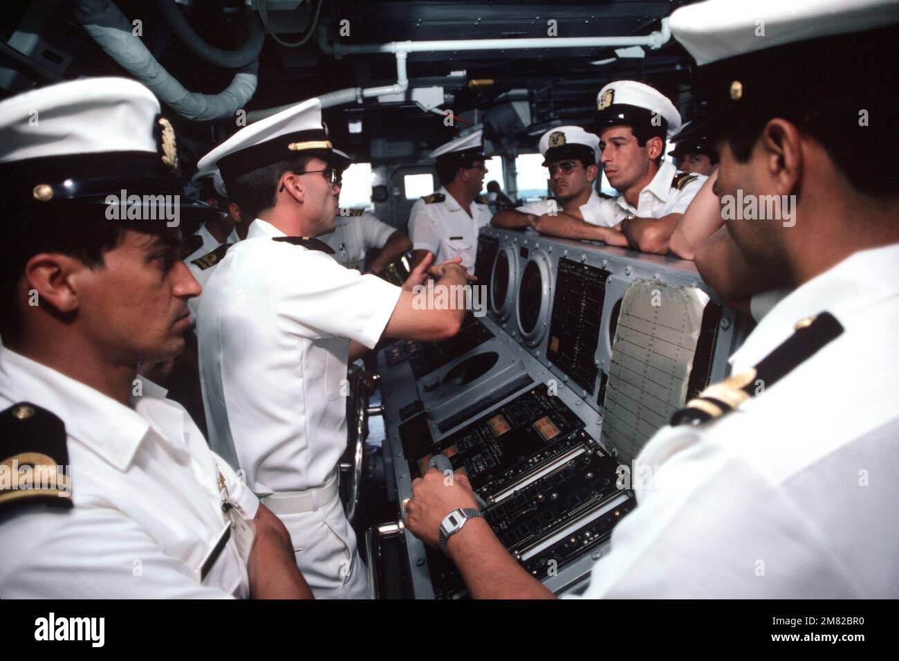 Officers from the Colombian Naval Academy tour the bridge of the ...