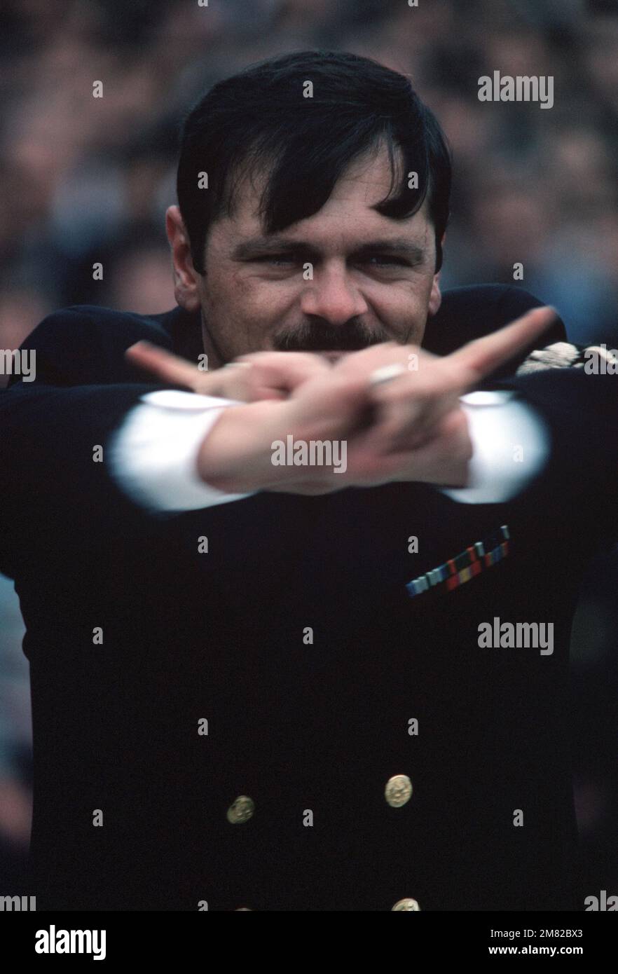 CHIEF Musician (MUC) Mark Hammond directs the UNITAS XXV Band during a ...