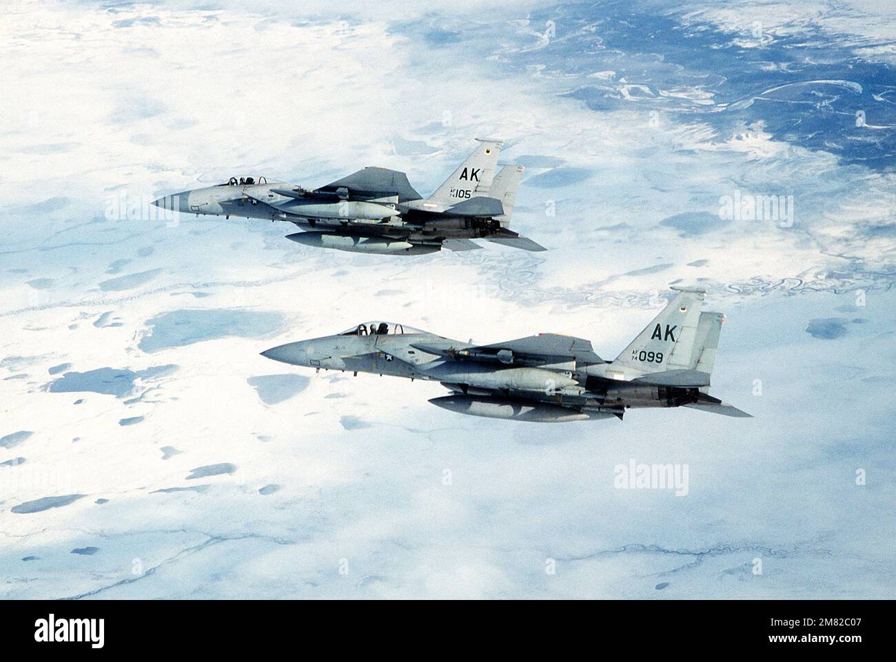 Air-to-air left side view of two F-15 Eagle aircraft of the 43rd ...