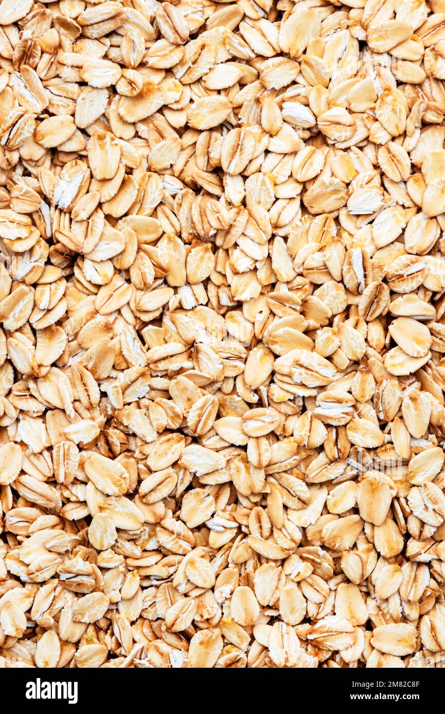 Raw organic oatmeal, food background texture, top view Stock Photo - Alamy
