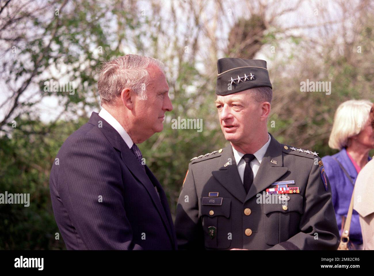 Secretary of the Army John O. Marsh speaks with GEN. Glenn K. Otis ...