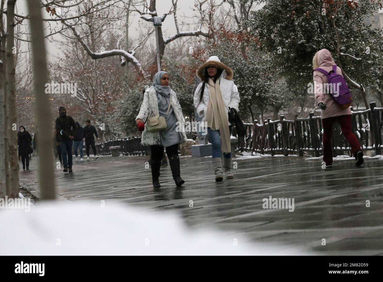 Tehran, Tehran, Iran. 11th Jan, 2023. Iranian women walk amid the snow ...