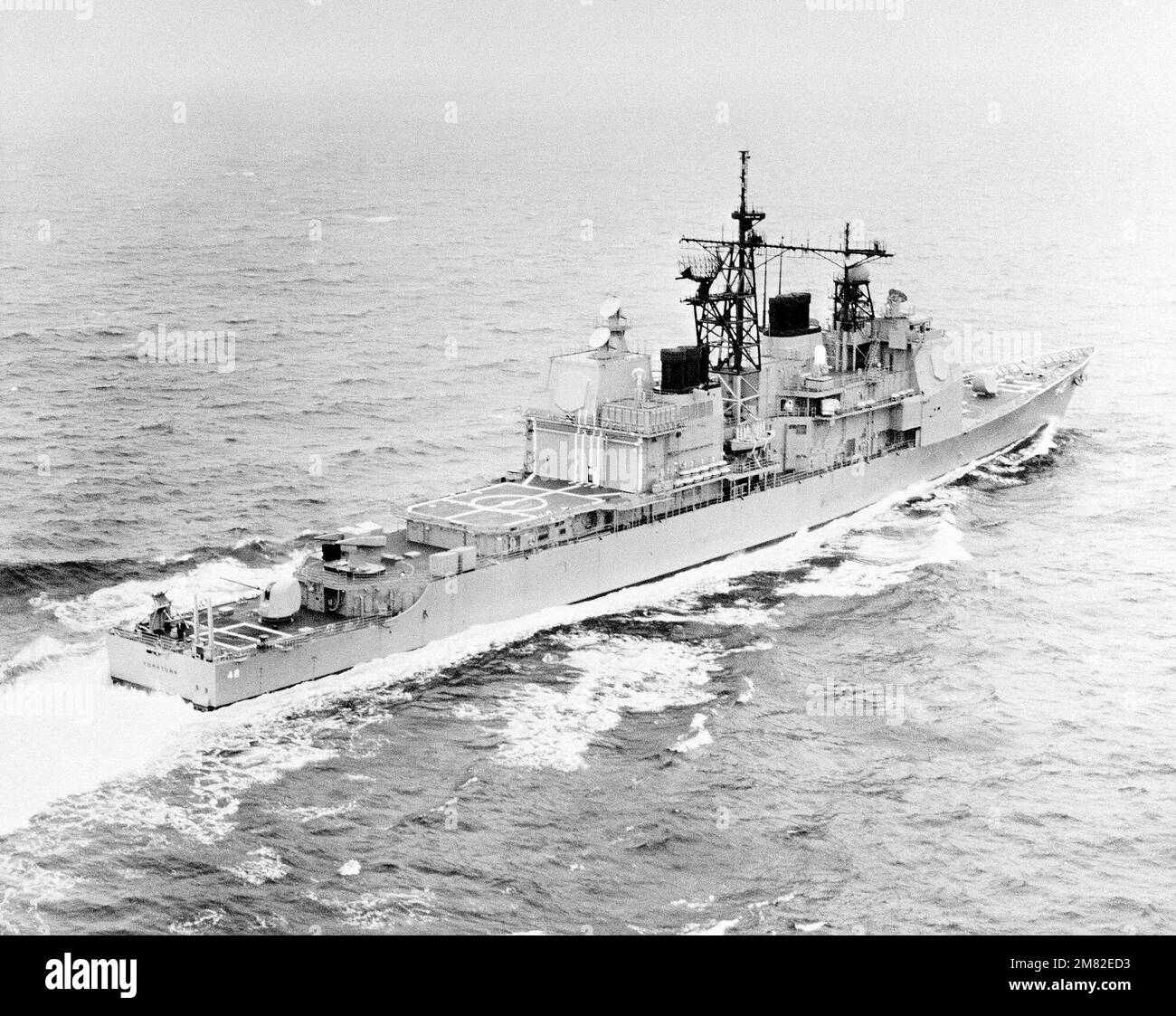 A starboard quarter view of the Aegis guided missile cruiser USS ...