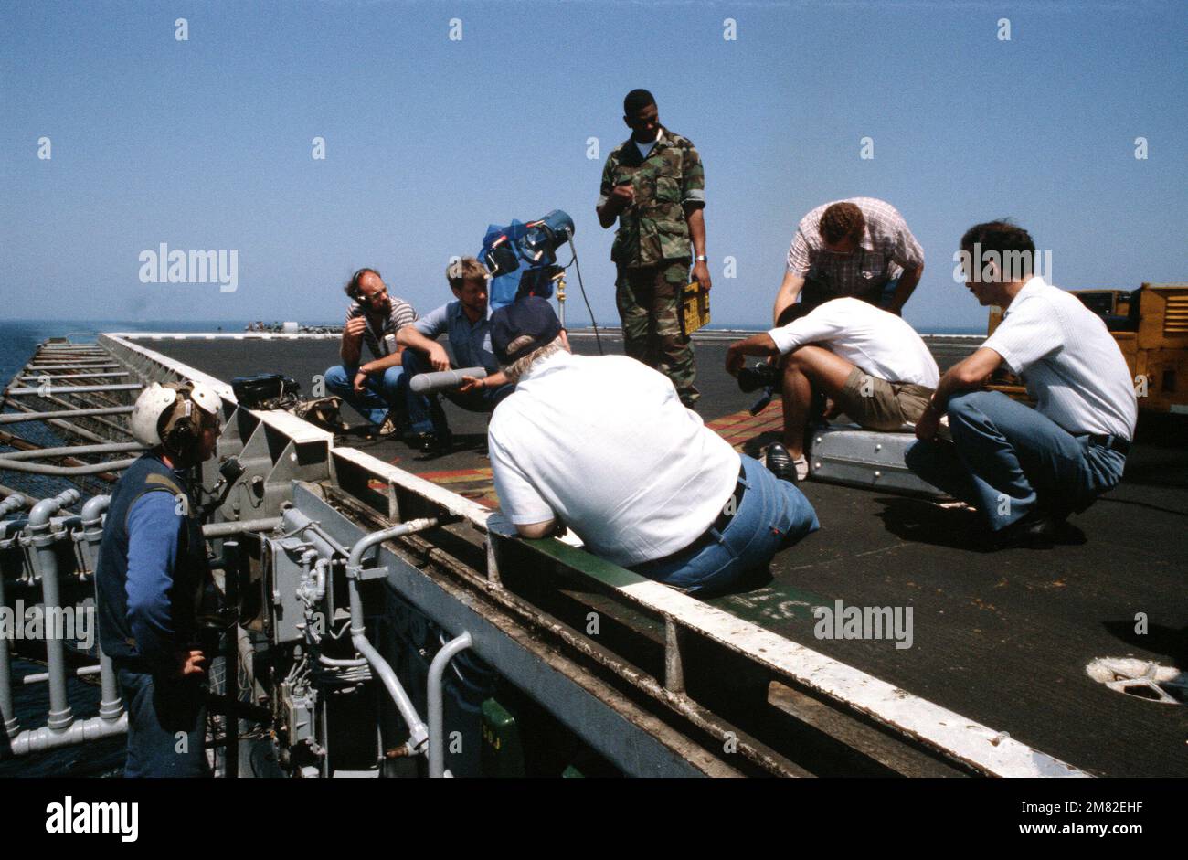 An elevator operator aboard the aircraft carrier USS JOHN F. KENNEDY ...