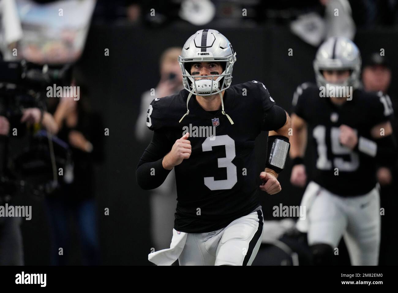 Las Vegas Raiders quarterback Jarrett Stidham (3) warms up before an NFL football game against ...