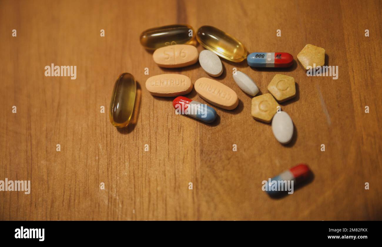 medication pills for sick hand them medicine tablets Stock Photo - Alamy