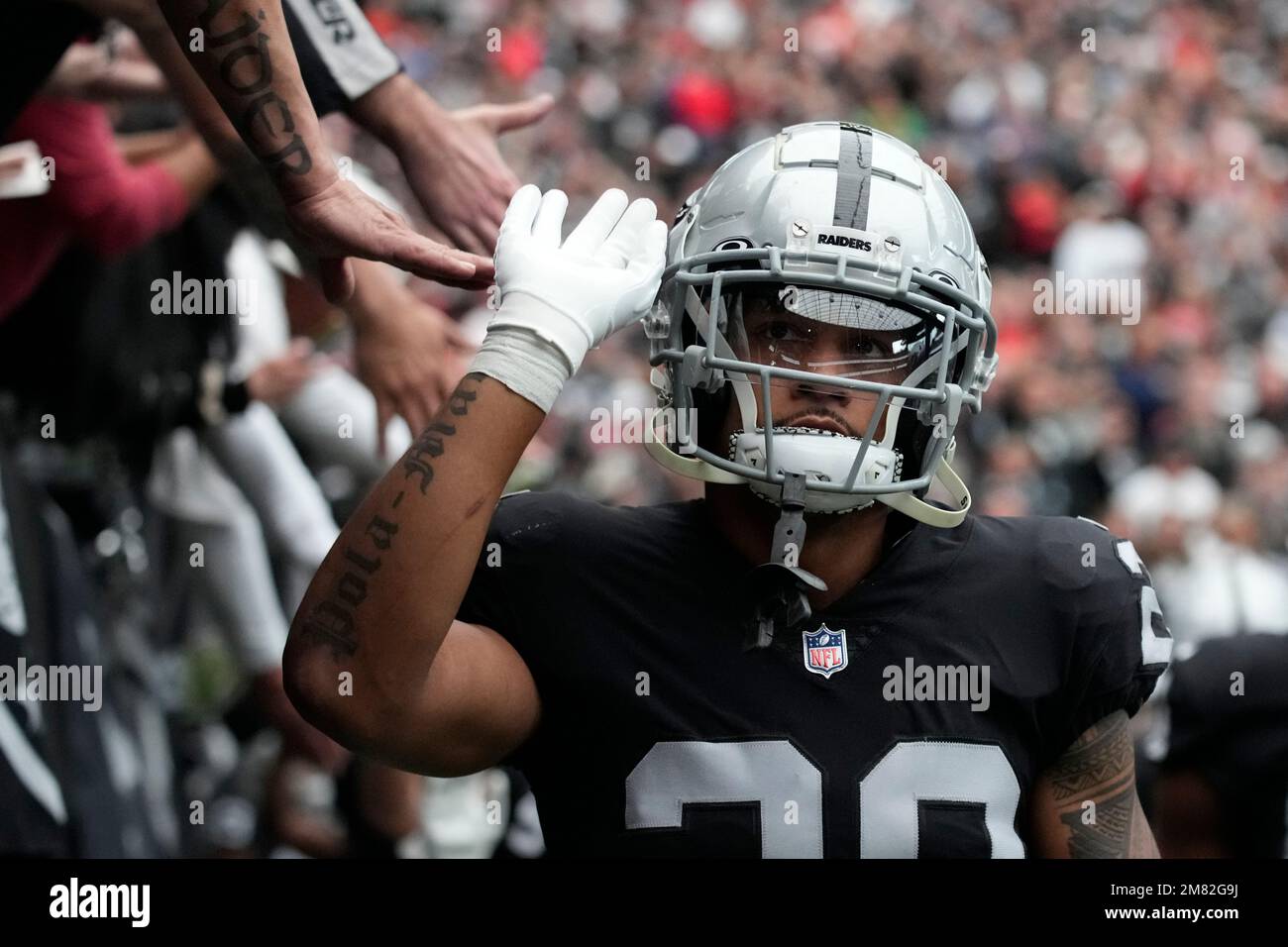 Las Vegas Raiders safety Isaiah Pola-Mao (20) before an NFL football game against the Kansas ...