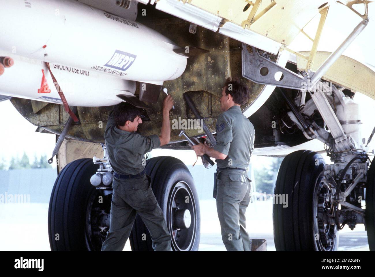 Members of the 410th Munitions Maintenance Squadron practice loading ...
