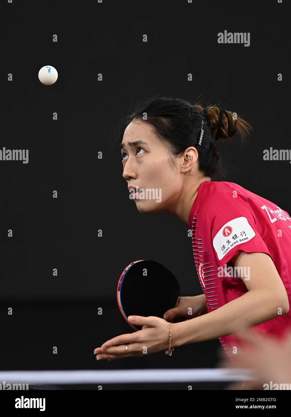 Doha, Qatar. 11th Jan, 2023. Zhu Chengzhu of China's Hong Kong serves ...