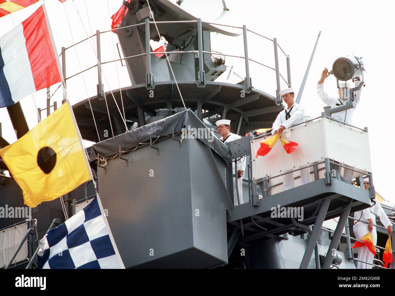 Signalmen aboard the Aegis guided missile cruiser USS YORKTOWN (CG 48 ...
