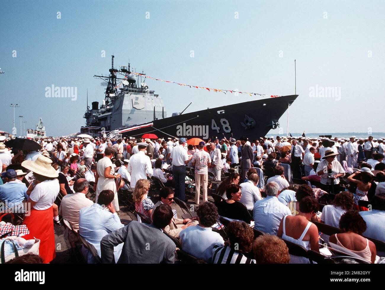 Guests in attendance at the commissioning ceremony for the Aegis guided ...