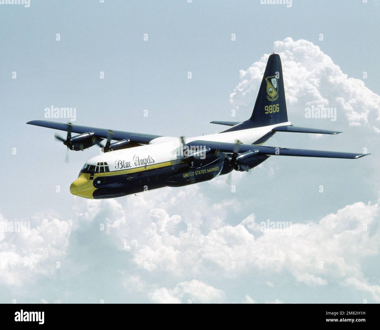An air-to-air left front view of a Marine Corps KC-130F Hercules ...