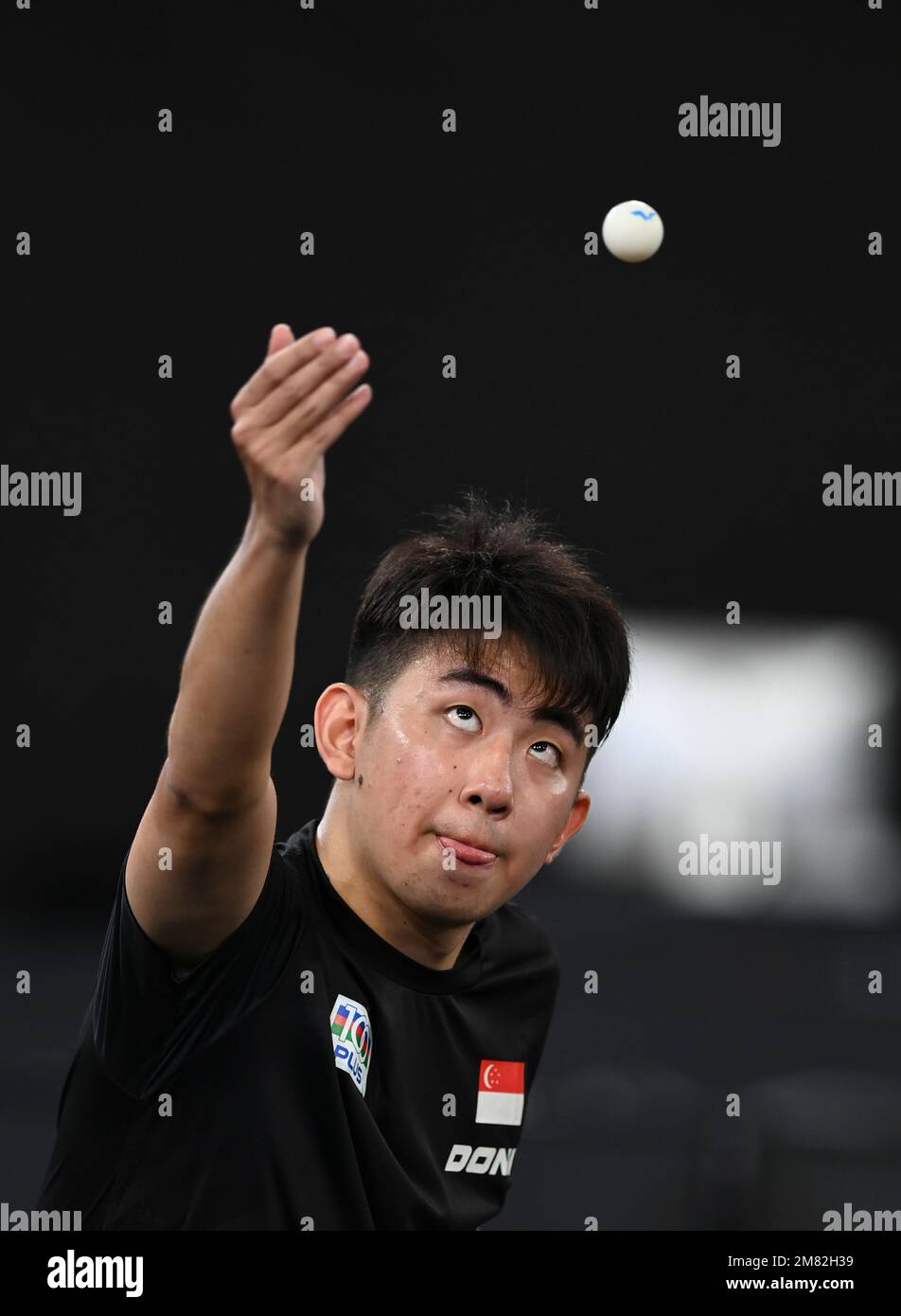 Doha, Qatar. 11th Jan, 2023. Pang Yew En Koen of Singapore serves ...