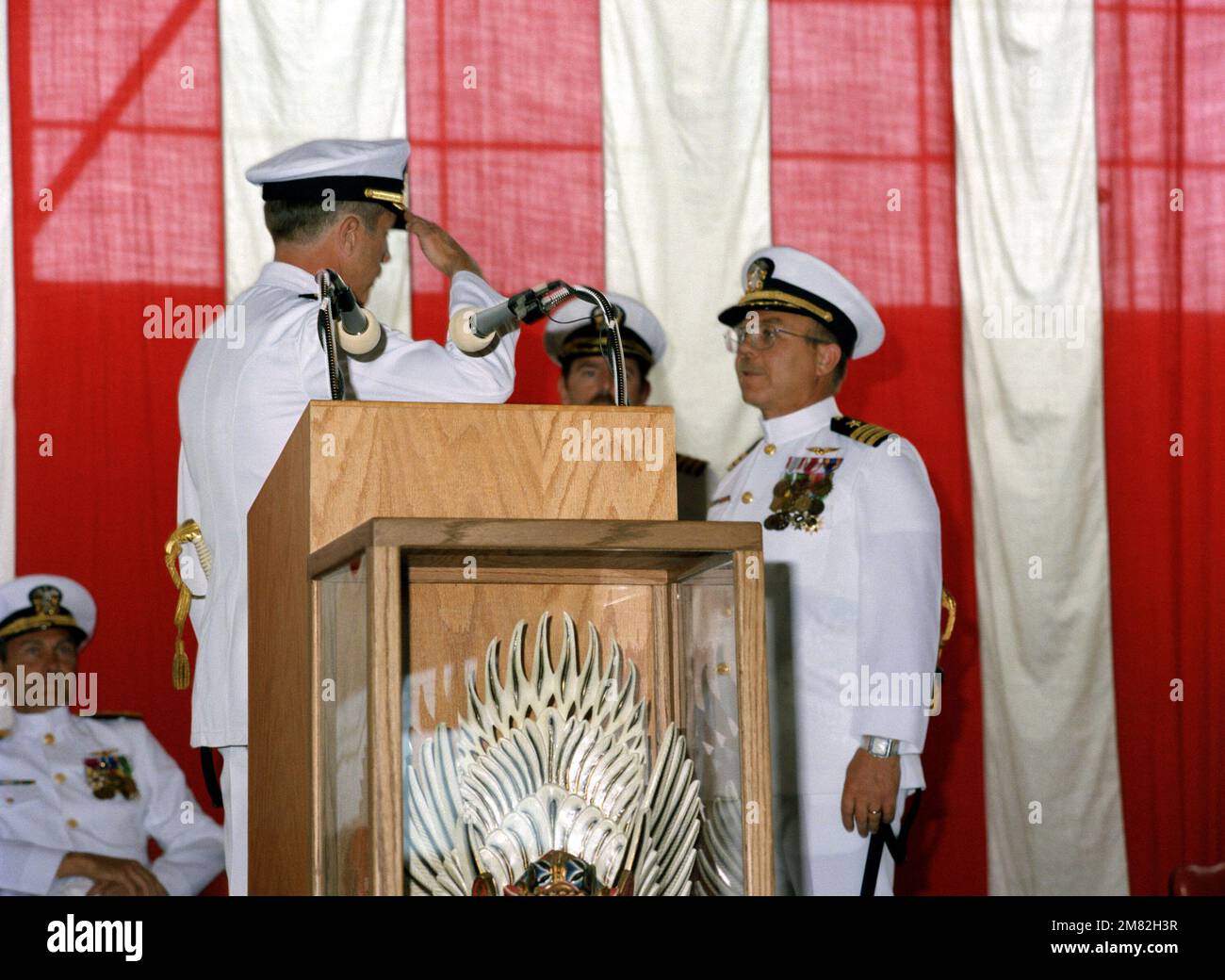Commander (CDR) Theodore J. Meserve is being relieved by CDR Thomas W ...