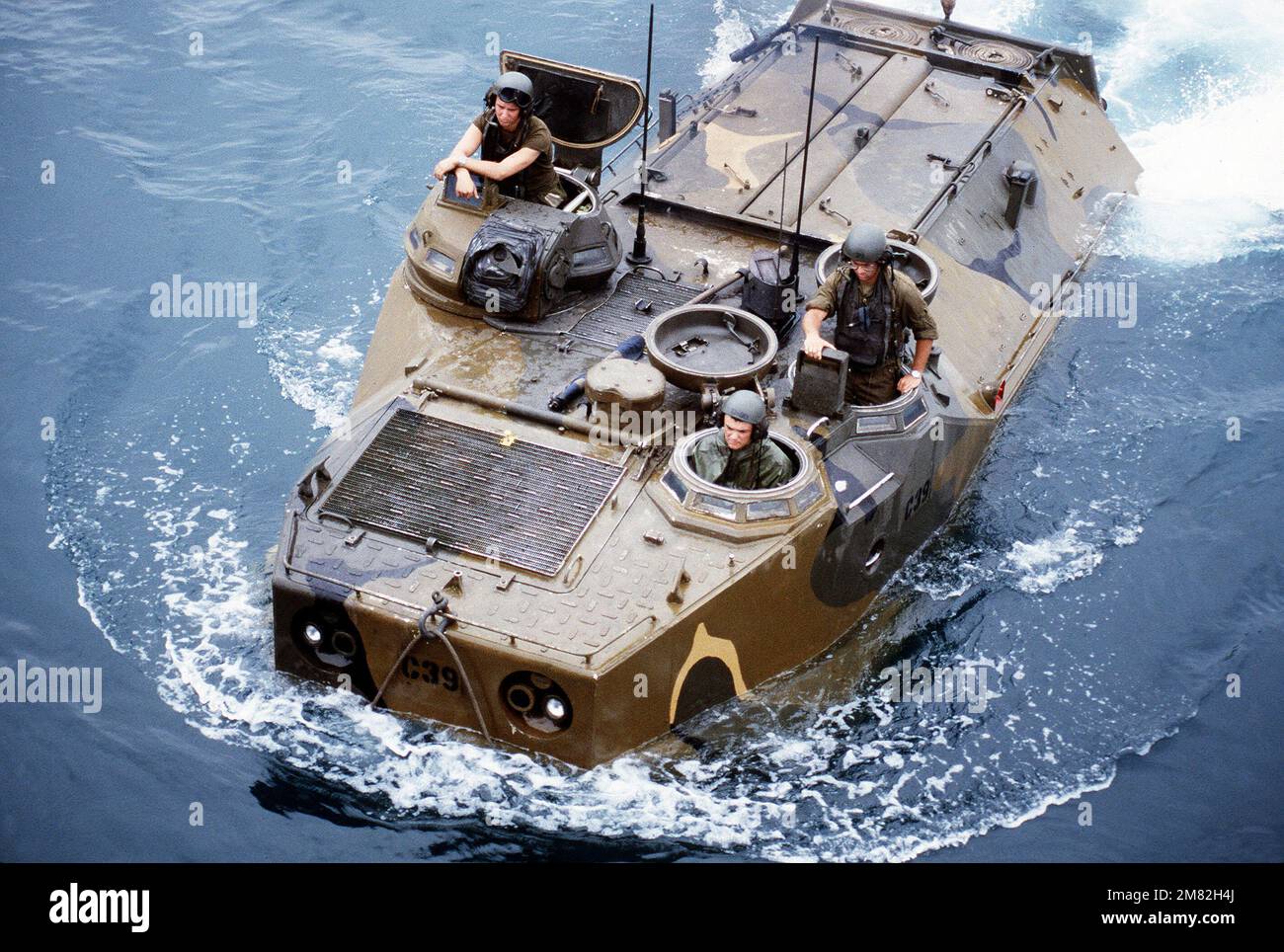 A U.S. Marine Corps AAVP-7 amphibious assault vehicle returns to the ...