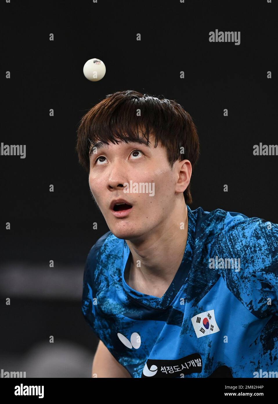 Doha, Qatar. 11th Jan, 2023. Lee Sangsu of South Korea serves during ...