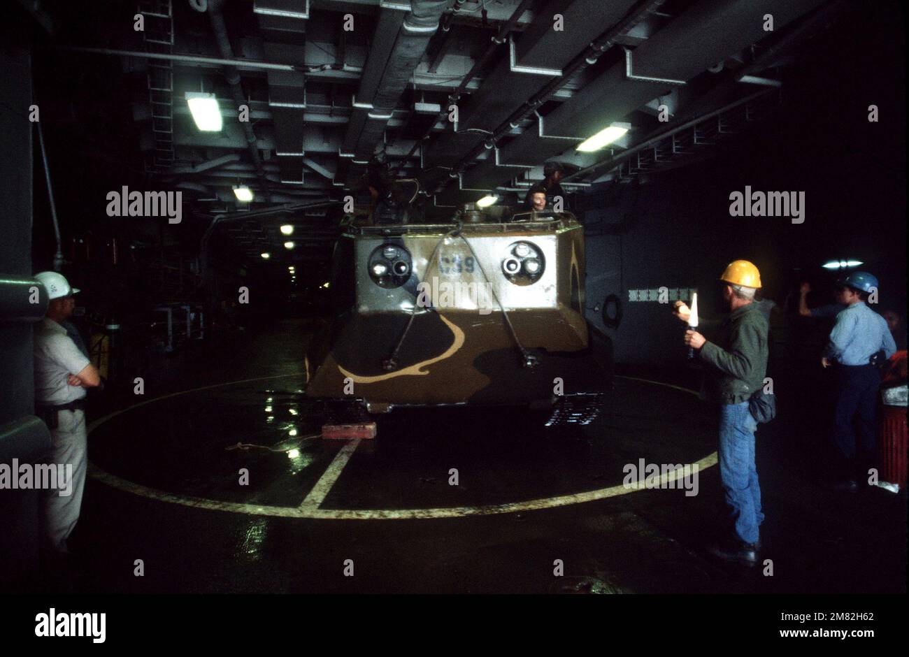 An AAVP-7 amphibious assault vehicle is brought about on a turntable in ...