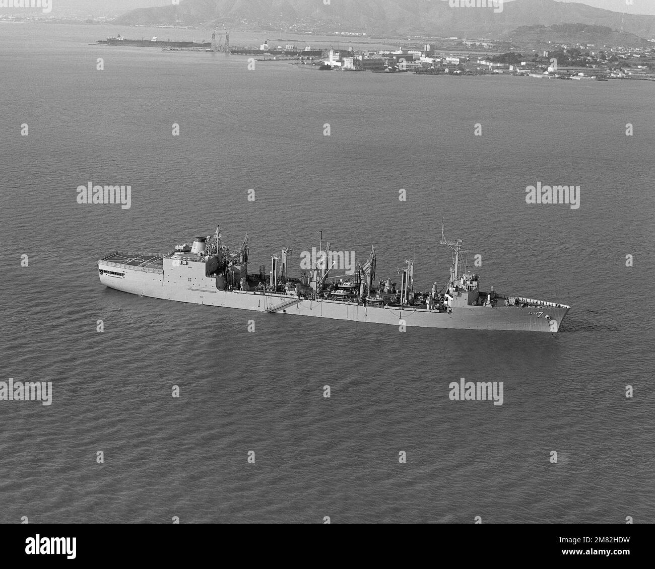 Aerial starboard beam view of the anchored replenishment oiler USS ...