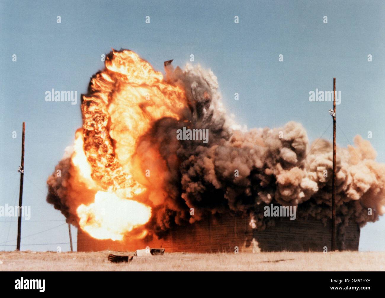 A concrete target explodes after being struck by a conventionally armed ...
